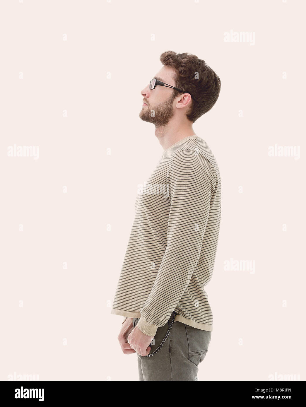 Side view . confident young man Stock Photo - Alamy