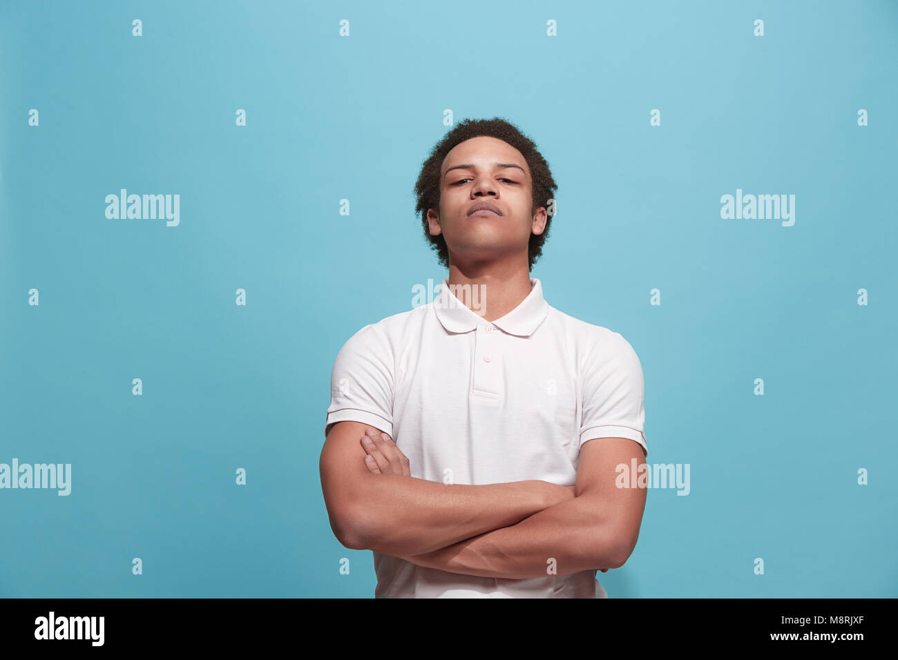 Suspiciont. Doubtful pensive man with thoughtful expression making ...