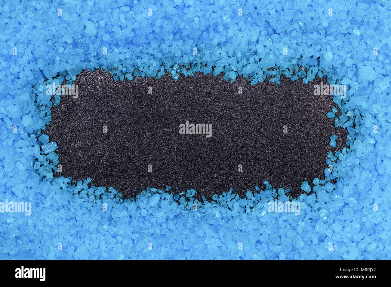 blue bath salt on a blackboard, background image, with space for text ...
