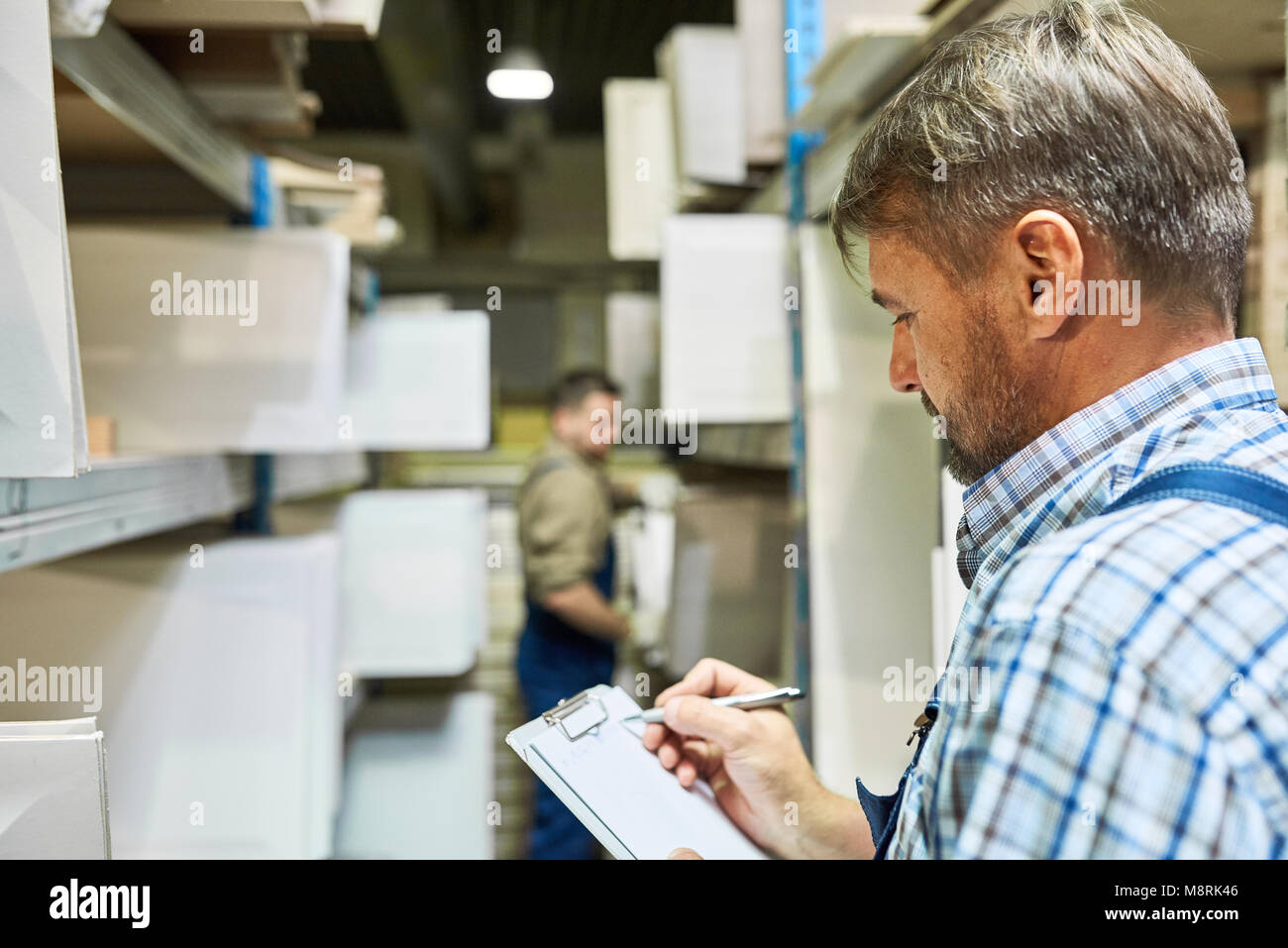 Workers Doing Inventory in Storage Stock Photo - Alamy