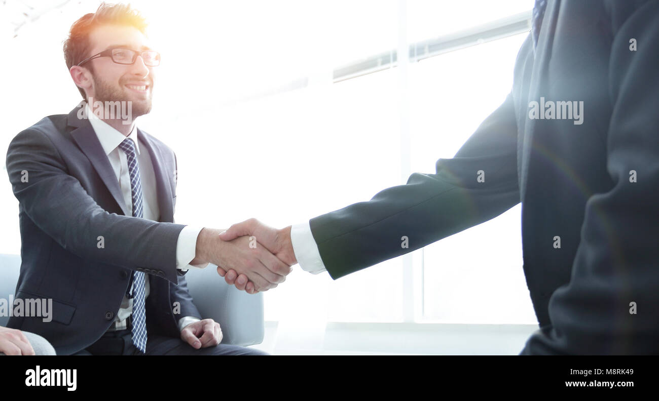 handshake business partners in the office Stock Photo - Alamy