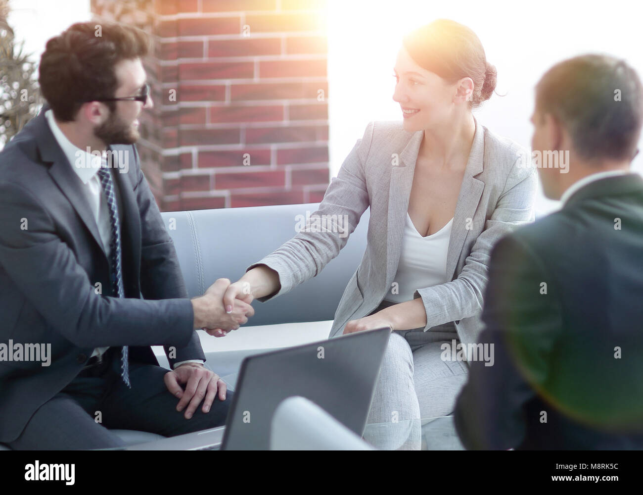 business handshake women with the client Stock Photo - Alamy