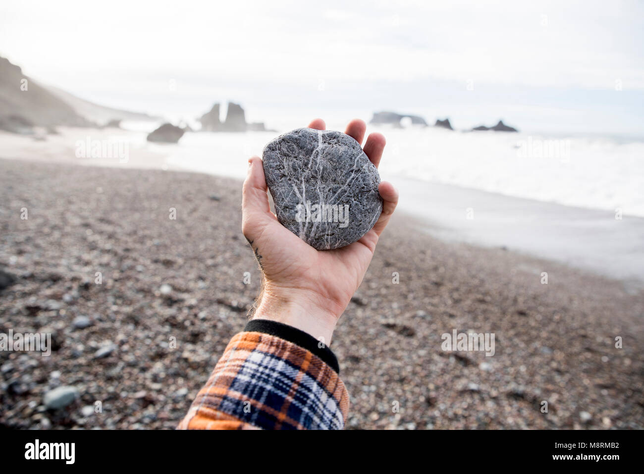 Old stone man beach hi-res stock photography and images - Alamy