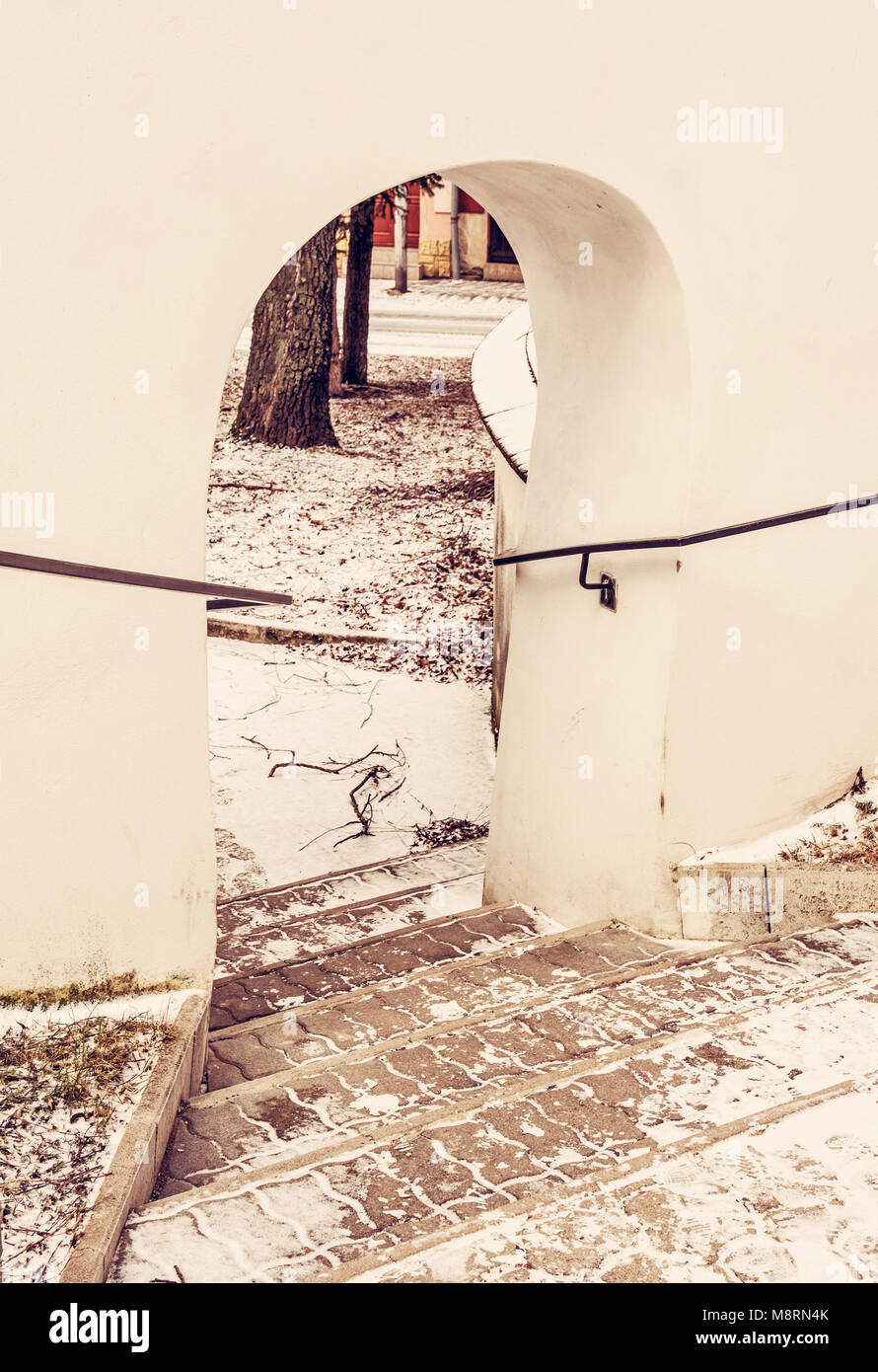 Shallow stairs and an historic gate with railing. Detailed ...