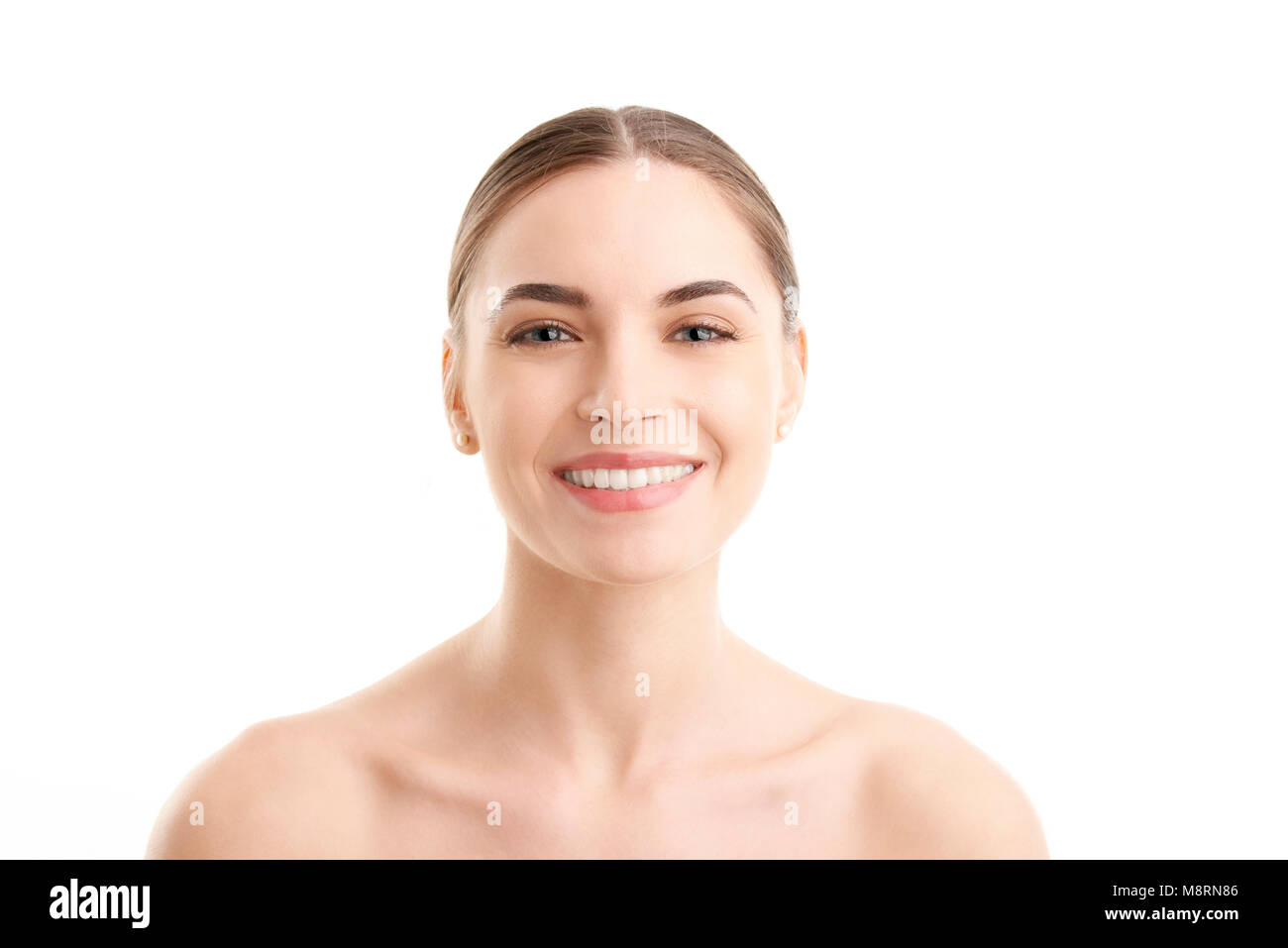 Cropped shot of beautiful young woman with toothy smile looking at ...