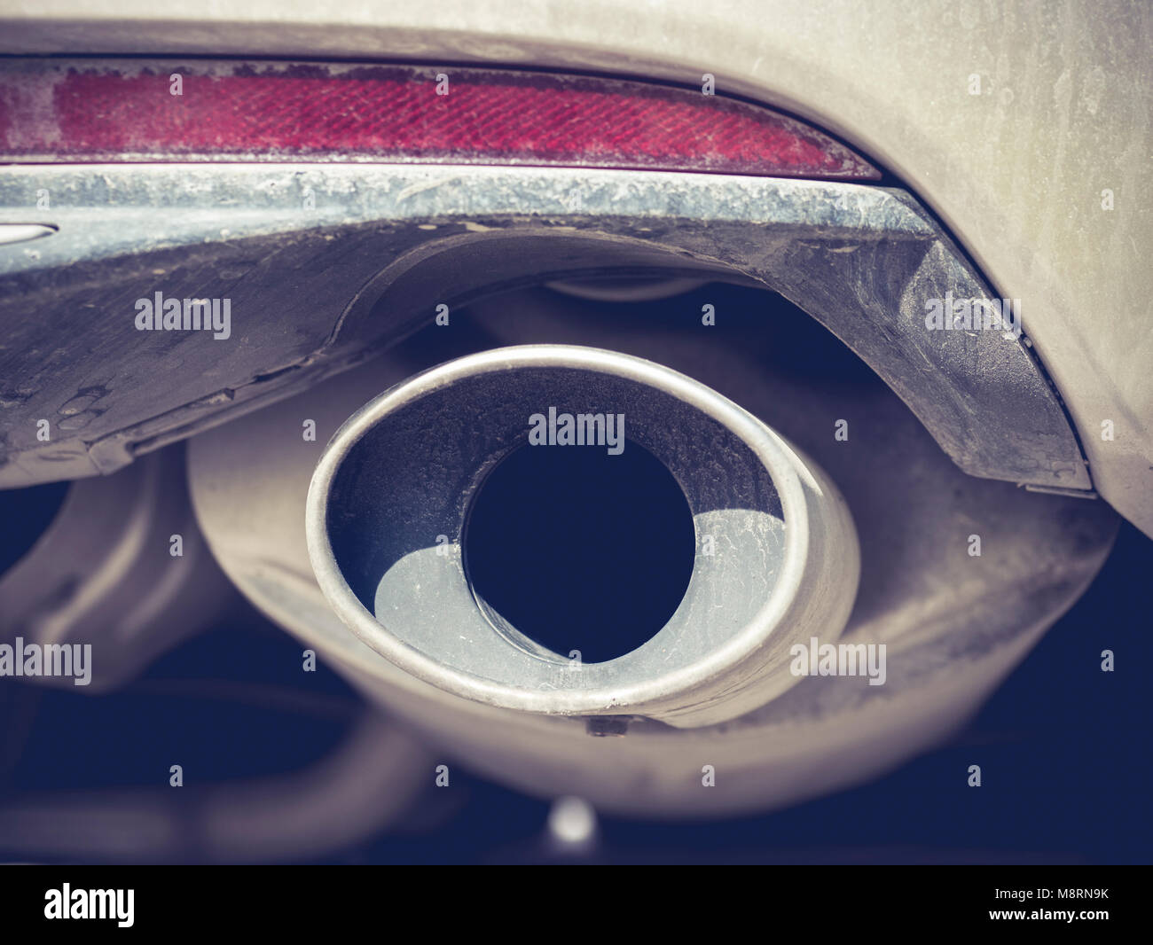 Close up of a car dual exhaust pipe Stock Photo - Alamy