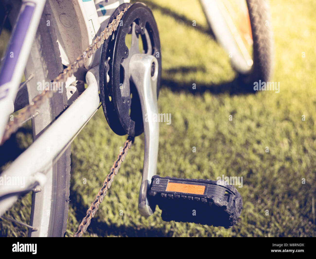 Bicycle pedal with a backdrop of artificial grass Stock Photo - Alamy