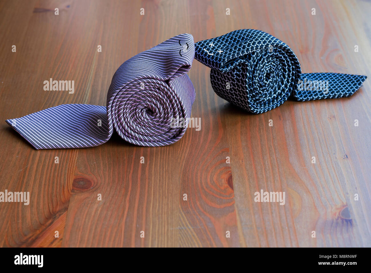 Rolled up tie hi-res stock photography and images - Alamy