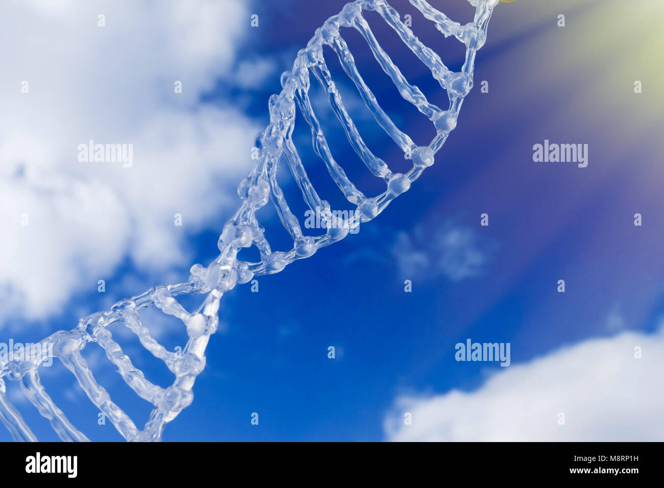 spiral dna against the blue sky with clouds Stock Photo - Alamy