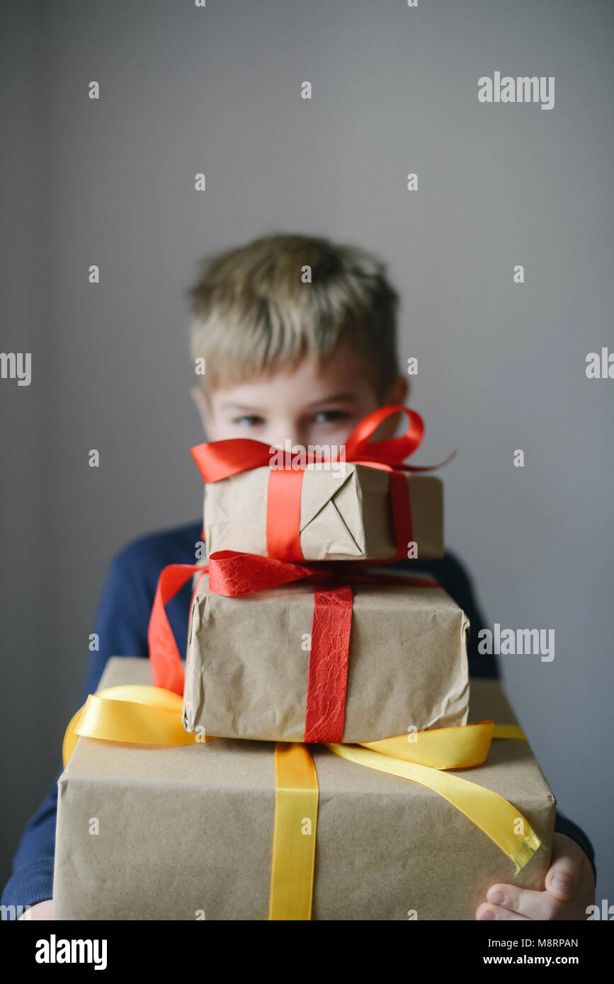 Boy carrying boxes hi-res stock photography and images - Alamy