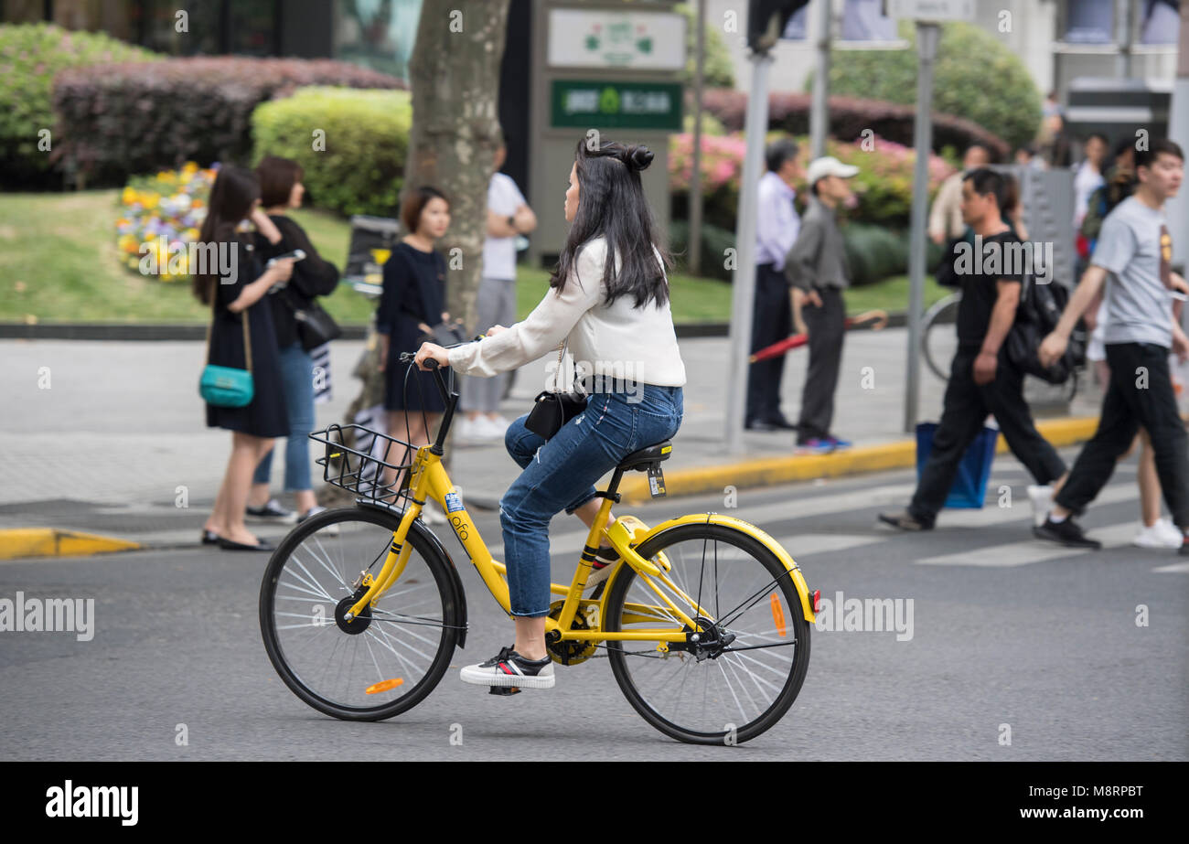 Chinese girl on bicycle hi-res stock photography and images - Alamy