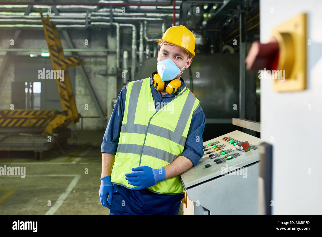 Young Machine Operator at Plant Stock Photo - Alamy
