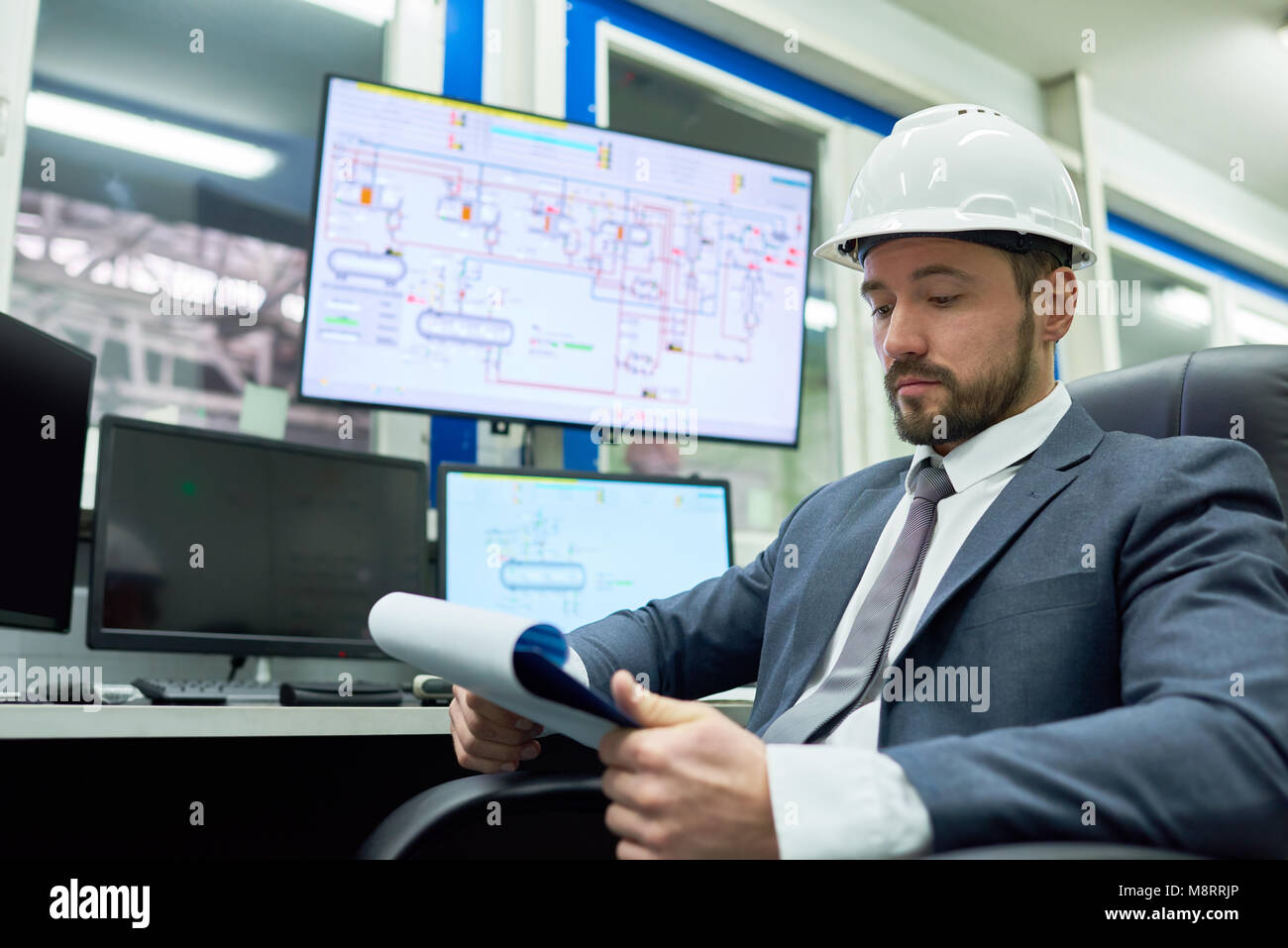 Plant Supervisor in Office Stock Photo - Alamy