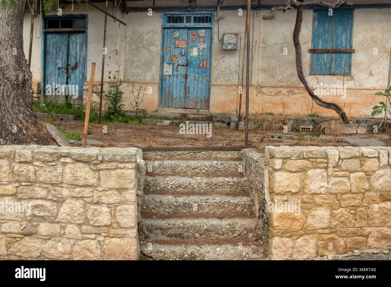 Abstract of blue doors and window at Ammonia in the Paphos countryside ...