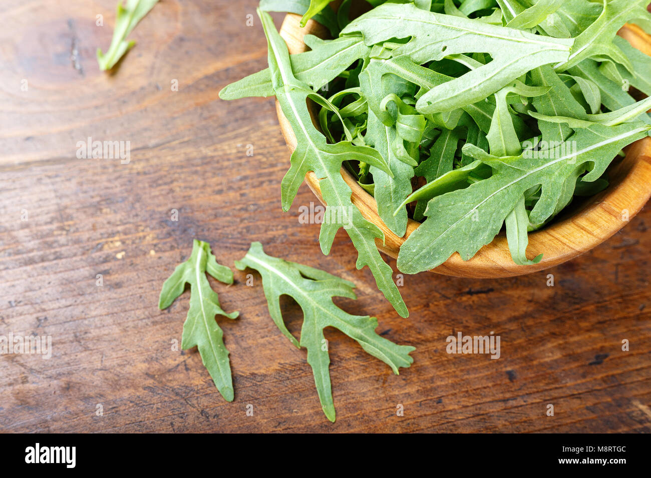 Arugula chopped in a plate, fresh organic greens, organic product, rich ...