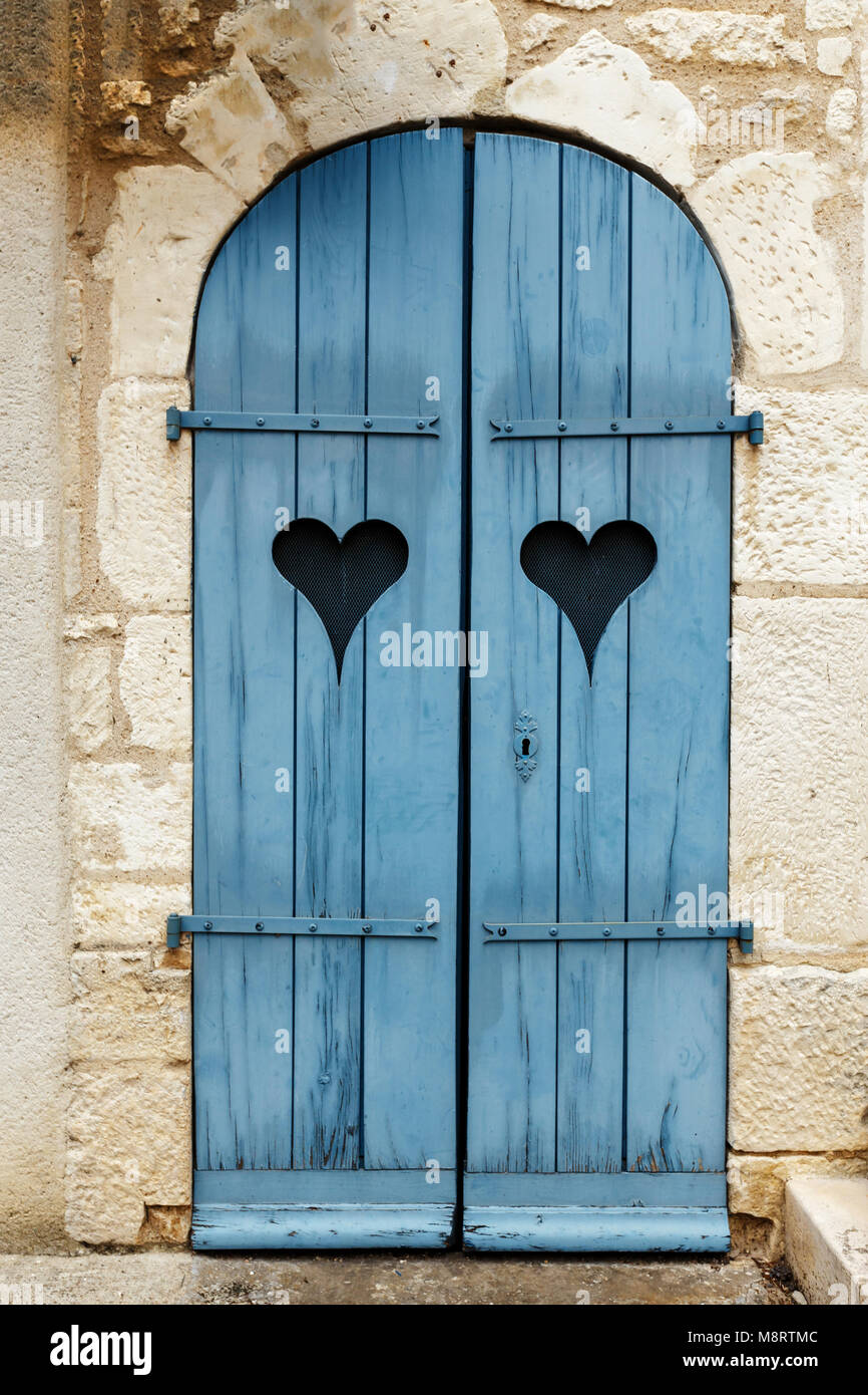old wooden closed shutters on windows, on shutters old paint Stock ...