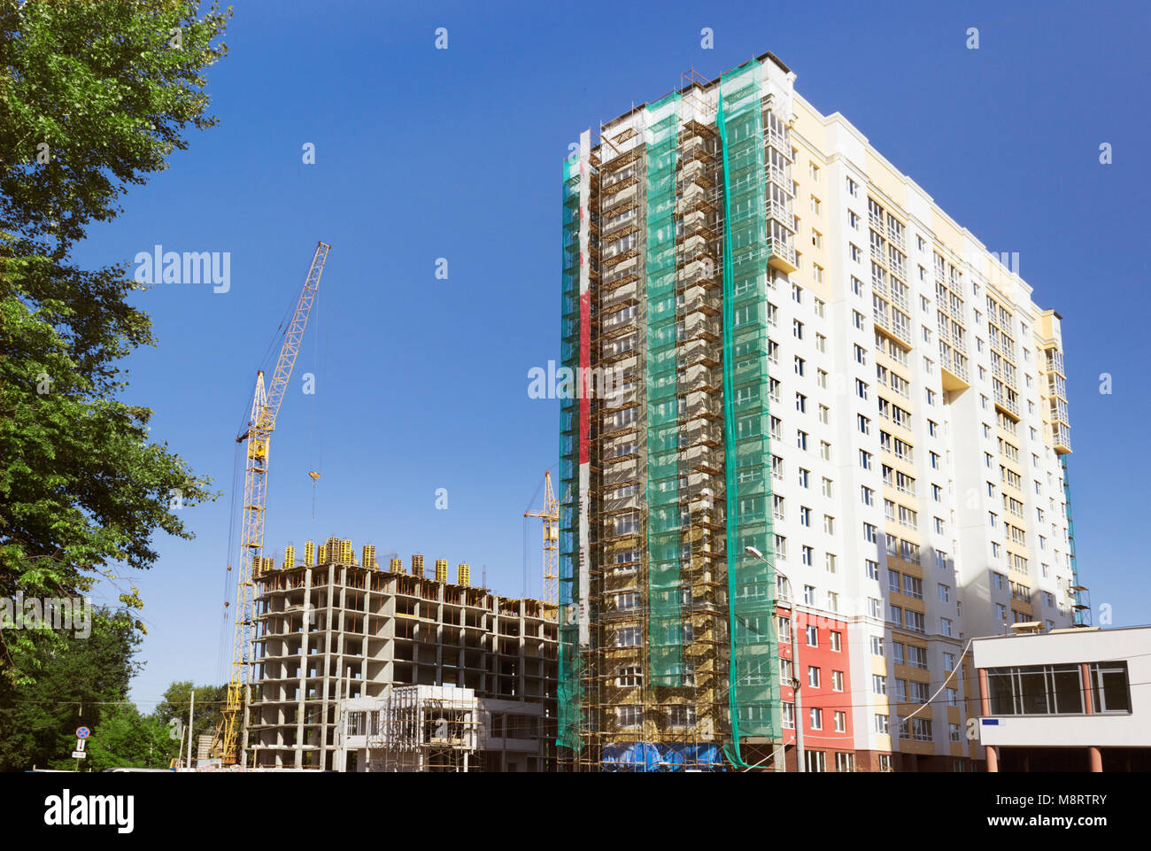 Two new multi-Storey Building Under Construction Stock Photo - Alamy