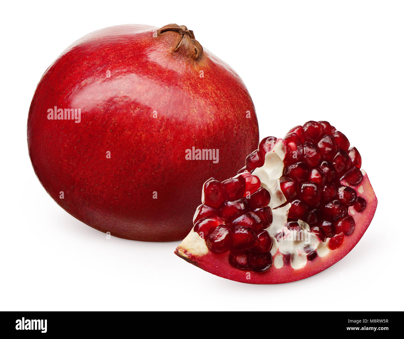 Whole fresh pomegranate and section isolated on white background Stock ...