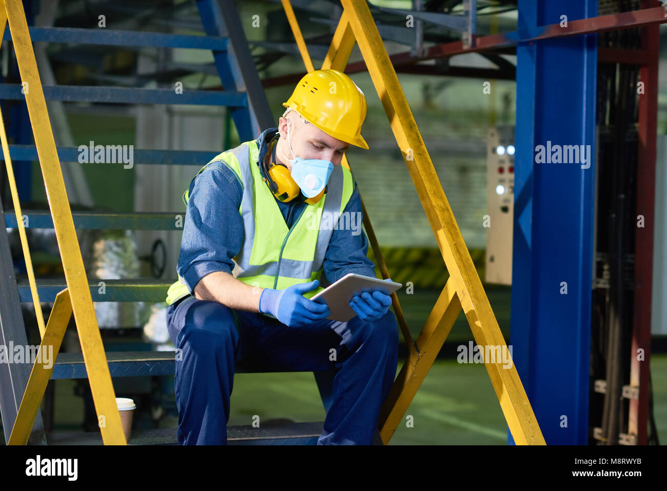 Workman tablet hi-res stock photography and images - Alamy