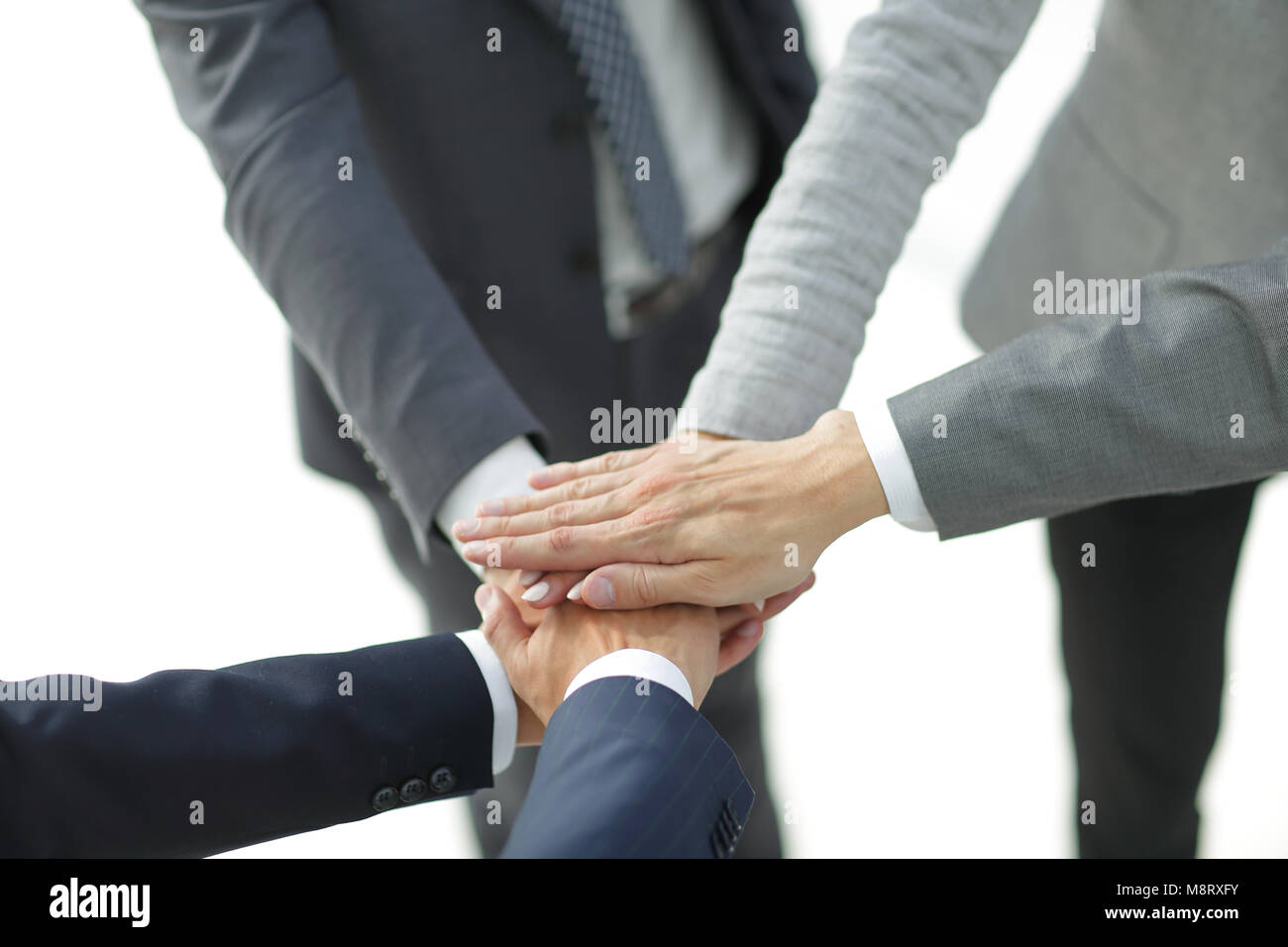 Top view of young people putting hands together Stock Photo - Alamy