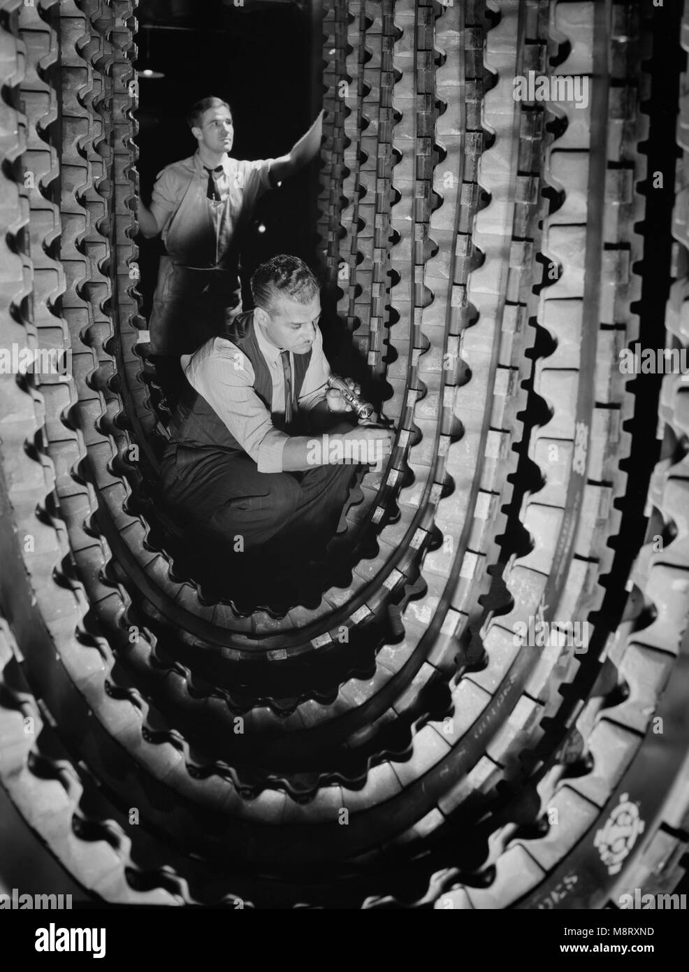 Two Workers Inspecting Tracks for Army's Half-Track Scout Cars, BF ...