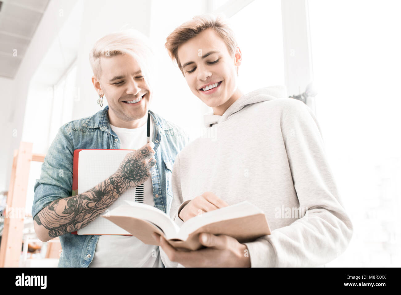 Cheerful male students Stock Photo - Alamy