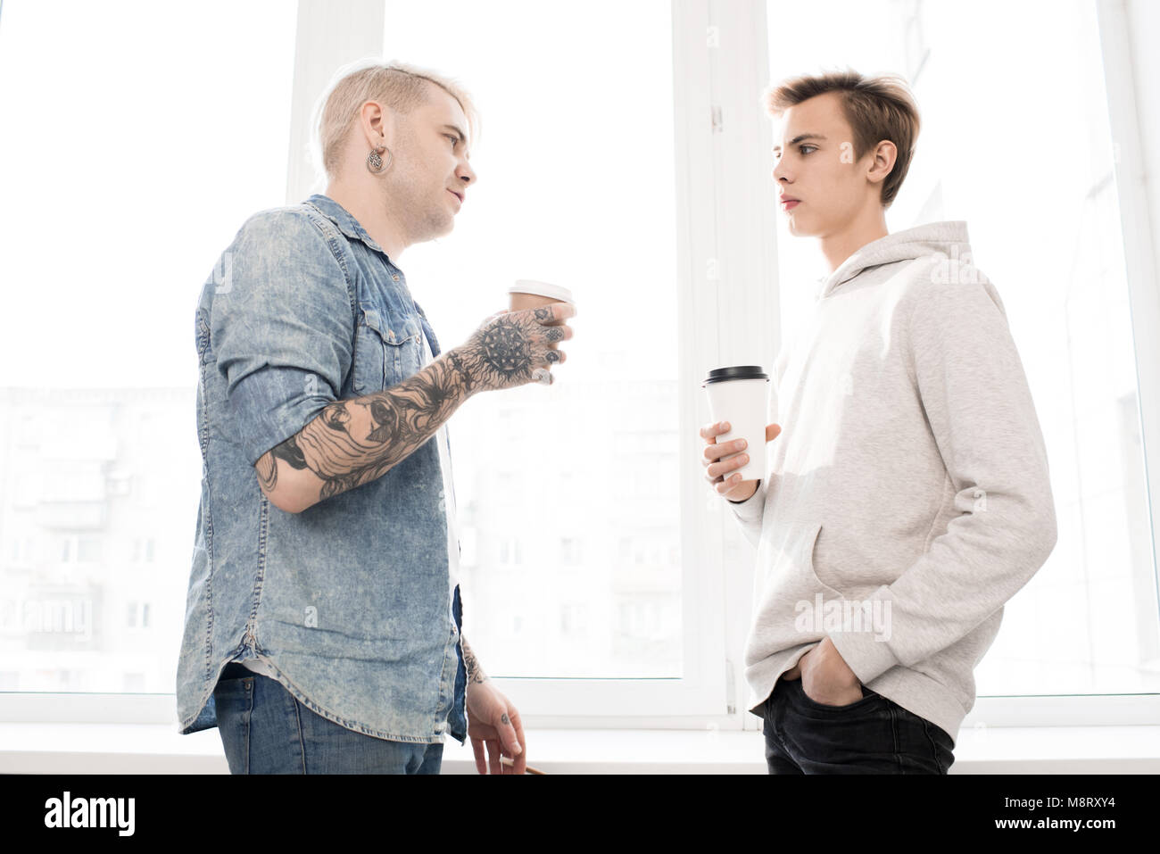 Students chatting over coffee Stock Photo - Alamy