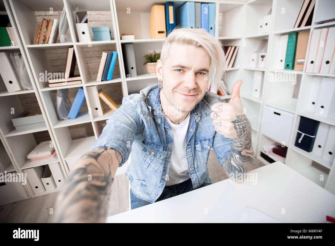 Positive adult college student Stock Photo - Alamy