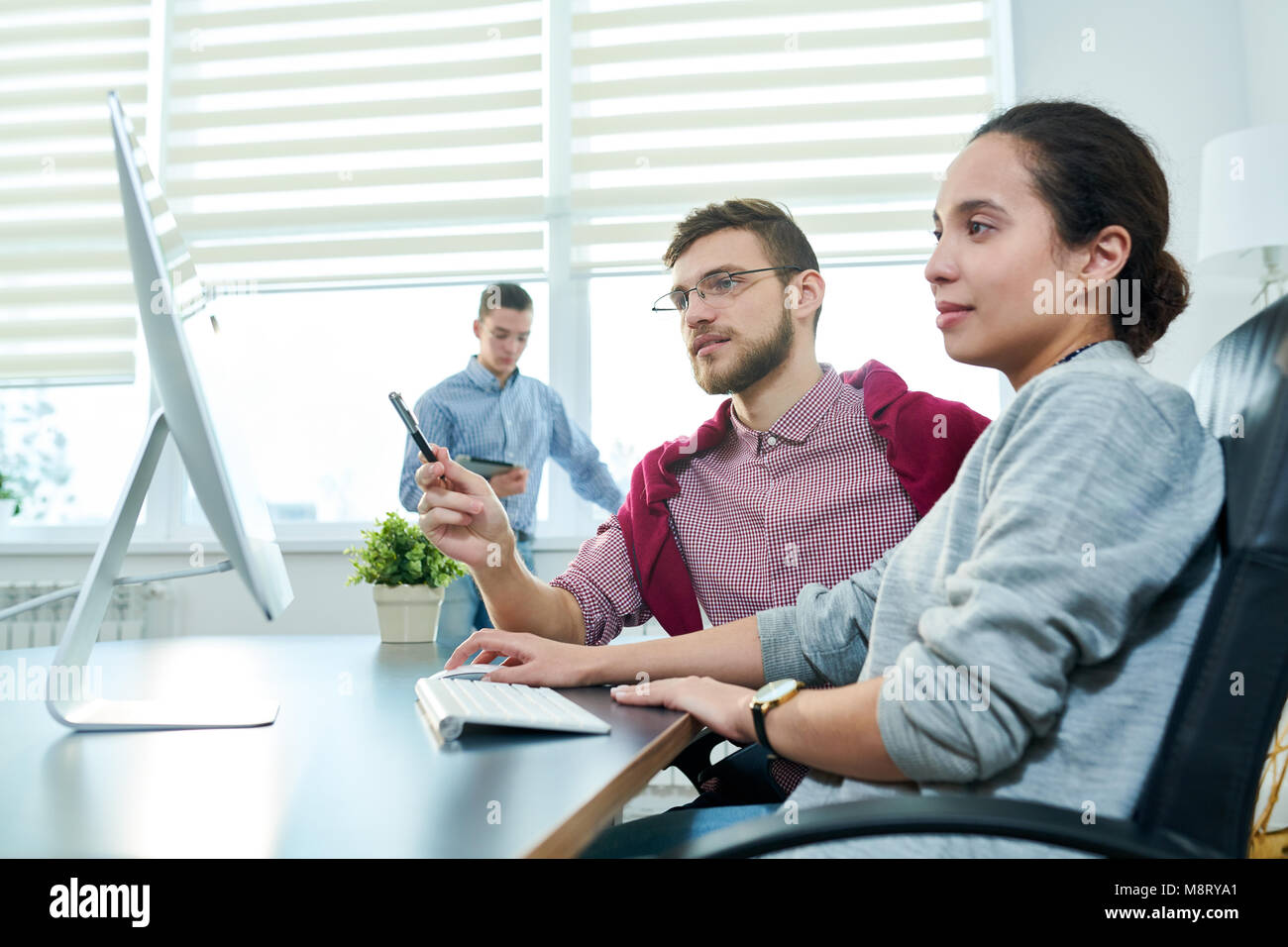 Managers thinking over project together Stock Photo - Alamy