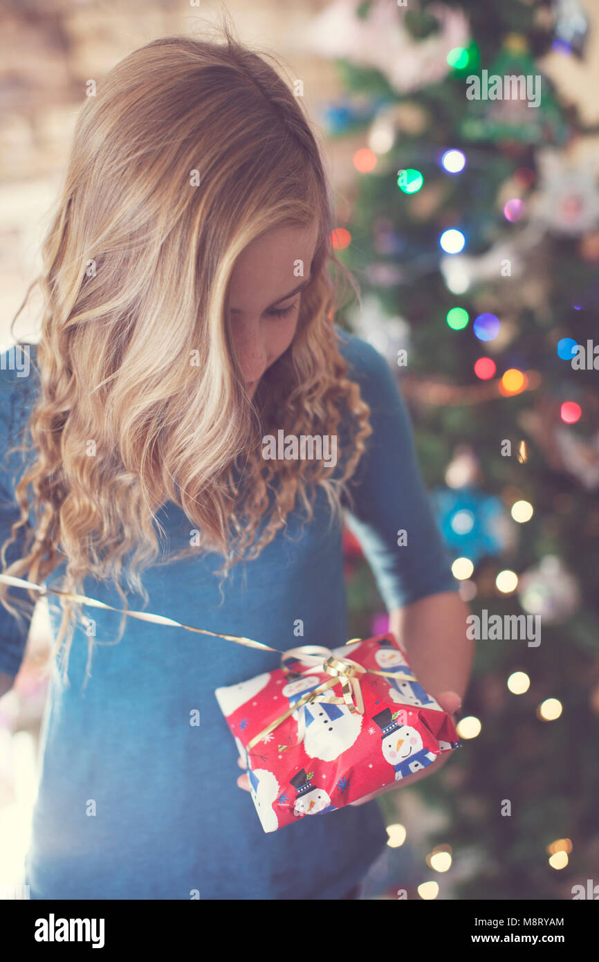 Girl opening present hi-res stock photography and images - Alamy