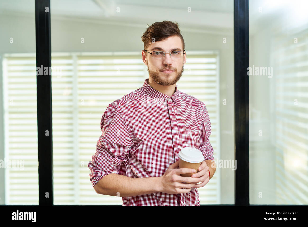 Confident male office worker Stock Photo - Alamy