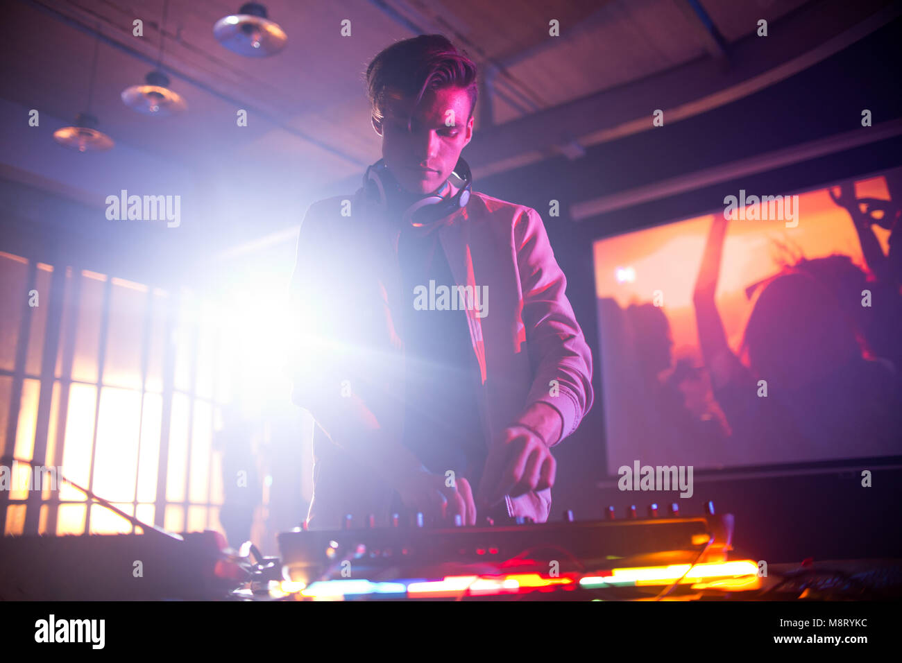 Handsome DJ Focused on Work Stock Photo - Alamy