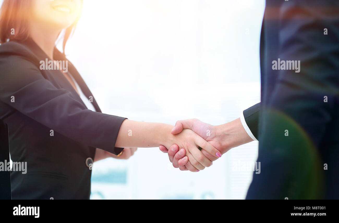 business colleagues shaking hands after a successful presentation Stock ...