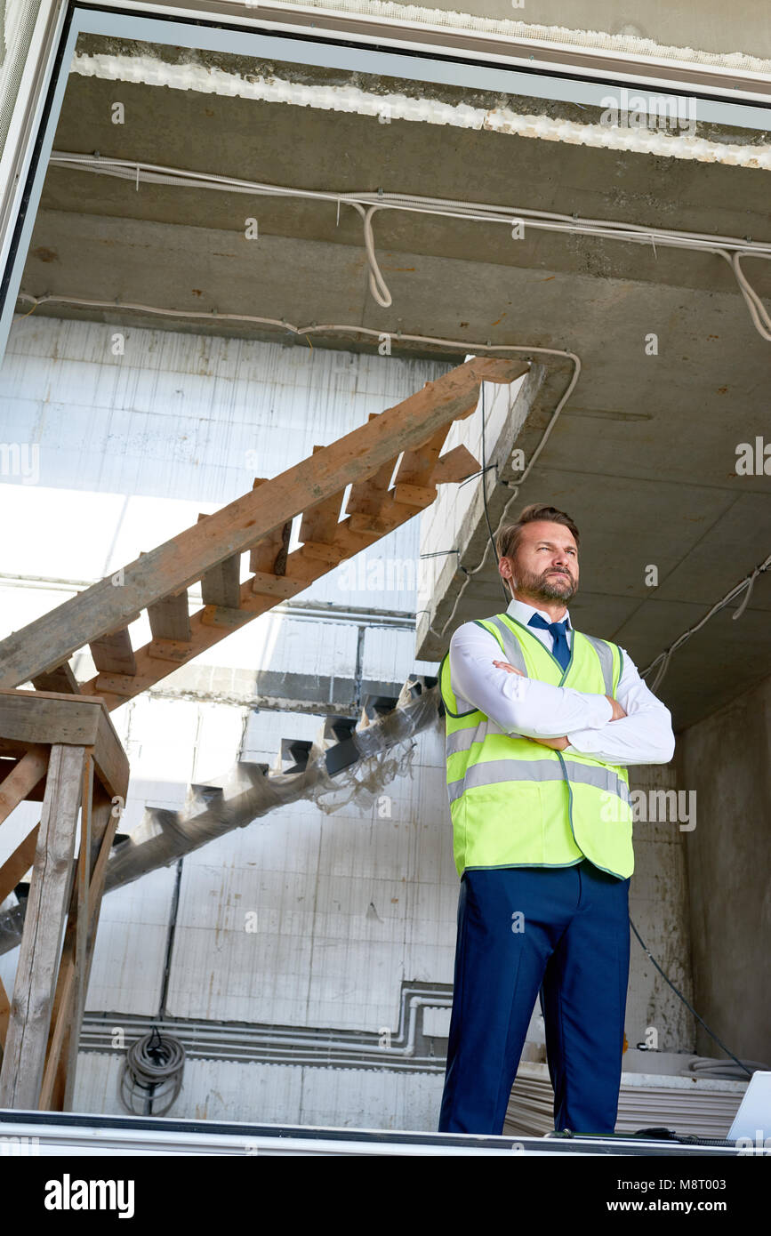 Handsome Businessman on Construction Site Stock Photo - Alamy
