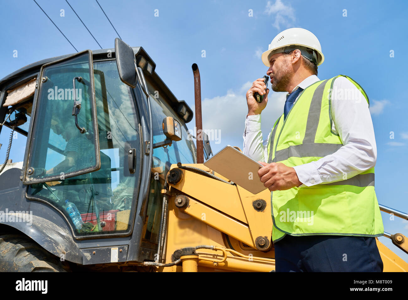 Construction Foreman Working on Site Stock Photo - Alamy