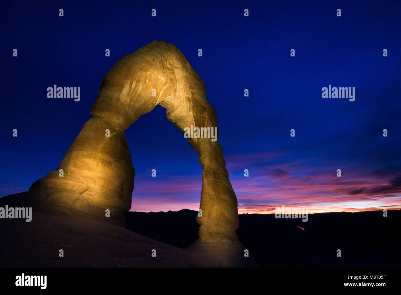 Sunset at Delicate Arch, located in Arches National Park, Utah Stock ...