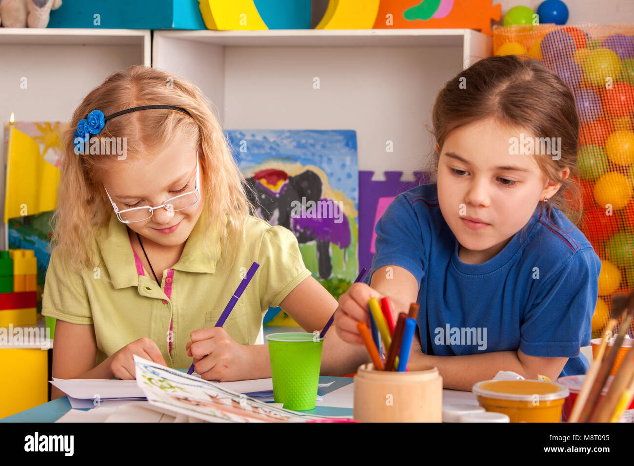 Small students children painting in art school class Stock Photo - Alamy