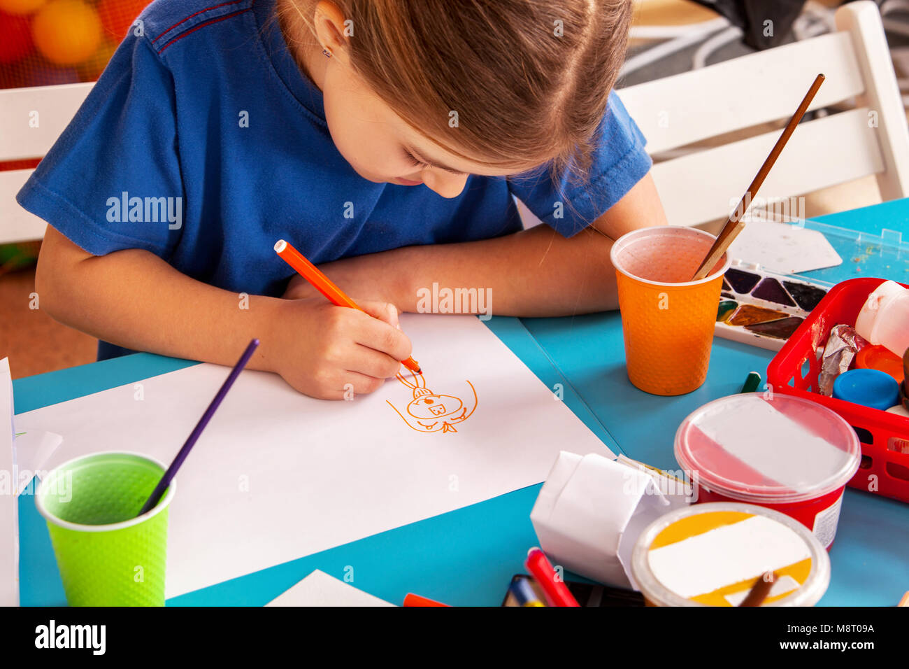 Small students children painting in art school class Stock Photo - Alamy