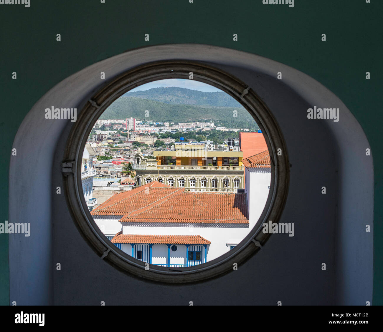 A view of the city of Santiago de Cuba through a window Stock Photo - Alamy