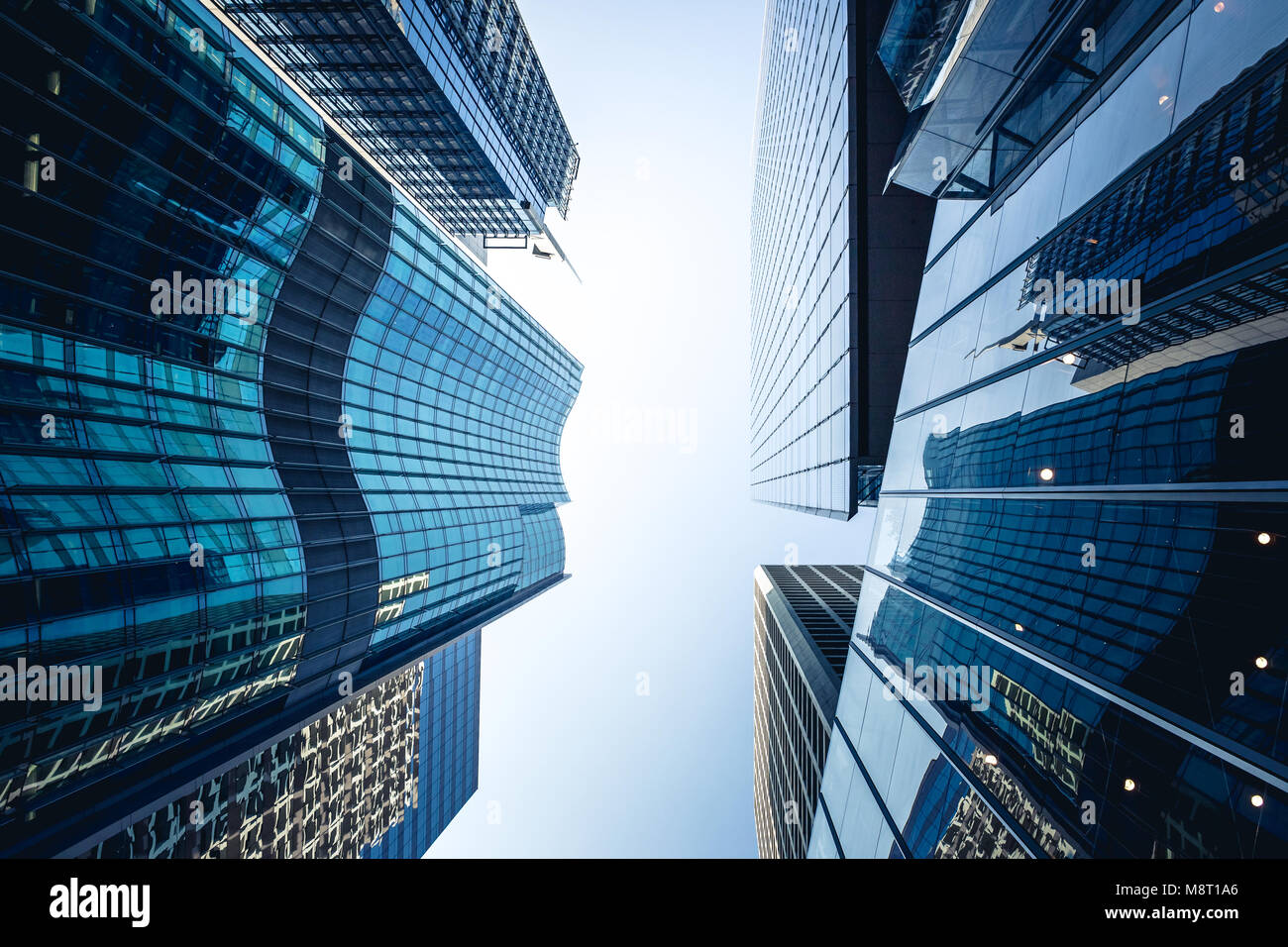 Bottom up view of Modern office building in Hong Kong Stock Photo - Alamy