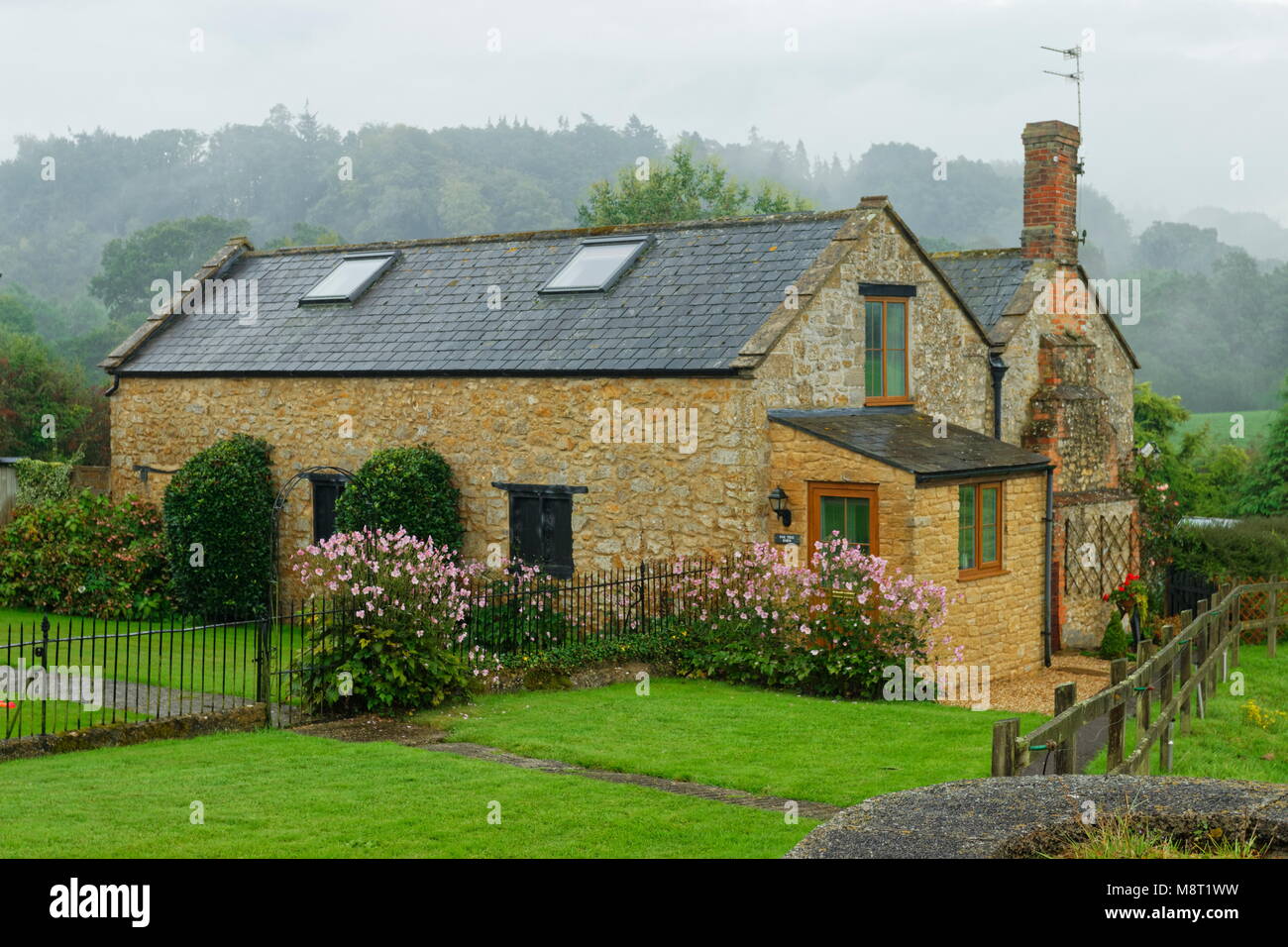 Converted barn cottage in Somerset Stock Photo - Alamy