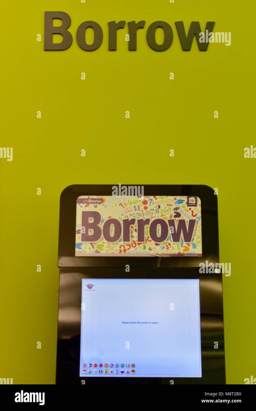 Borrow sign and borrowing booth at a library, CityLibraries Aitkenvale ...