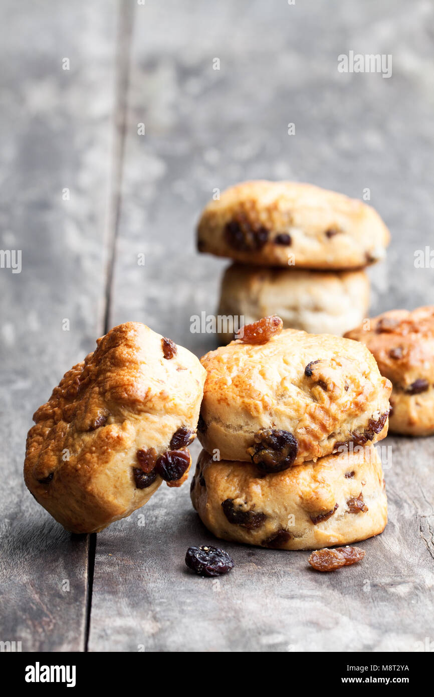 Homemade sultana scones on wooden table Stock Photo - Alamy
