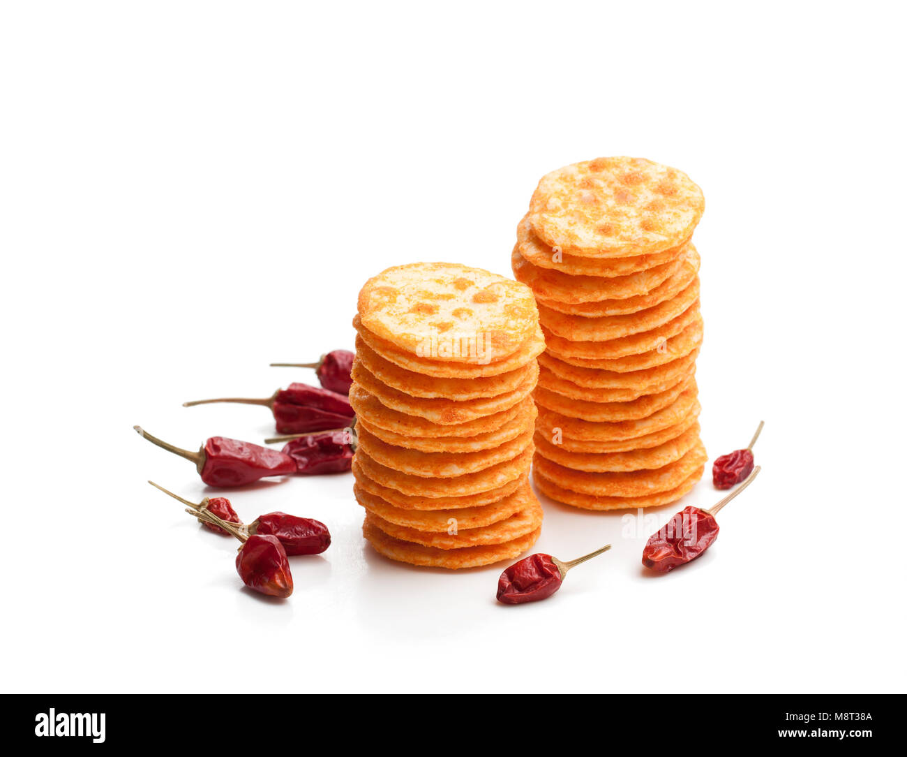 Round shape rice cracker with chili pepper isolated on white Stock ...