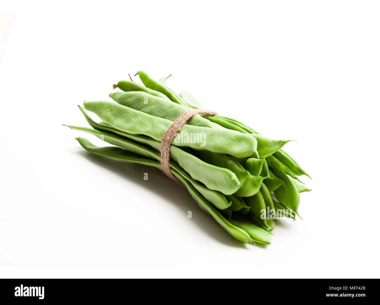 Bundle of green beans isolated on white Stock Photo - Alamy