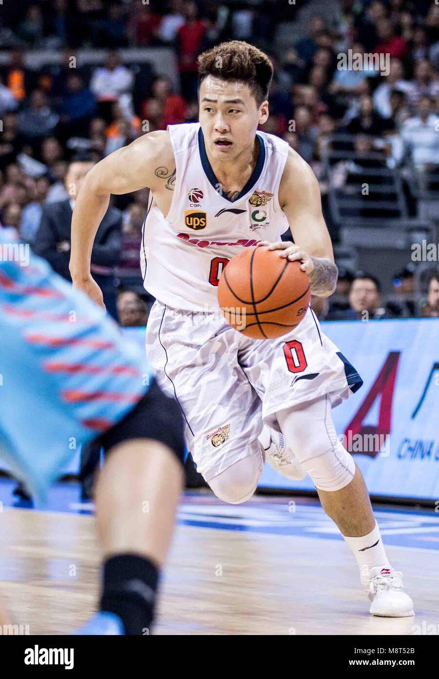 The Xinjiang Flying Tigers Basketball Team defeats Guangdong Tigers 95 ...