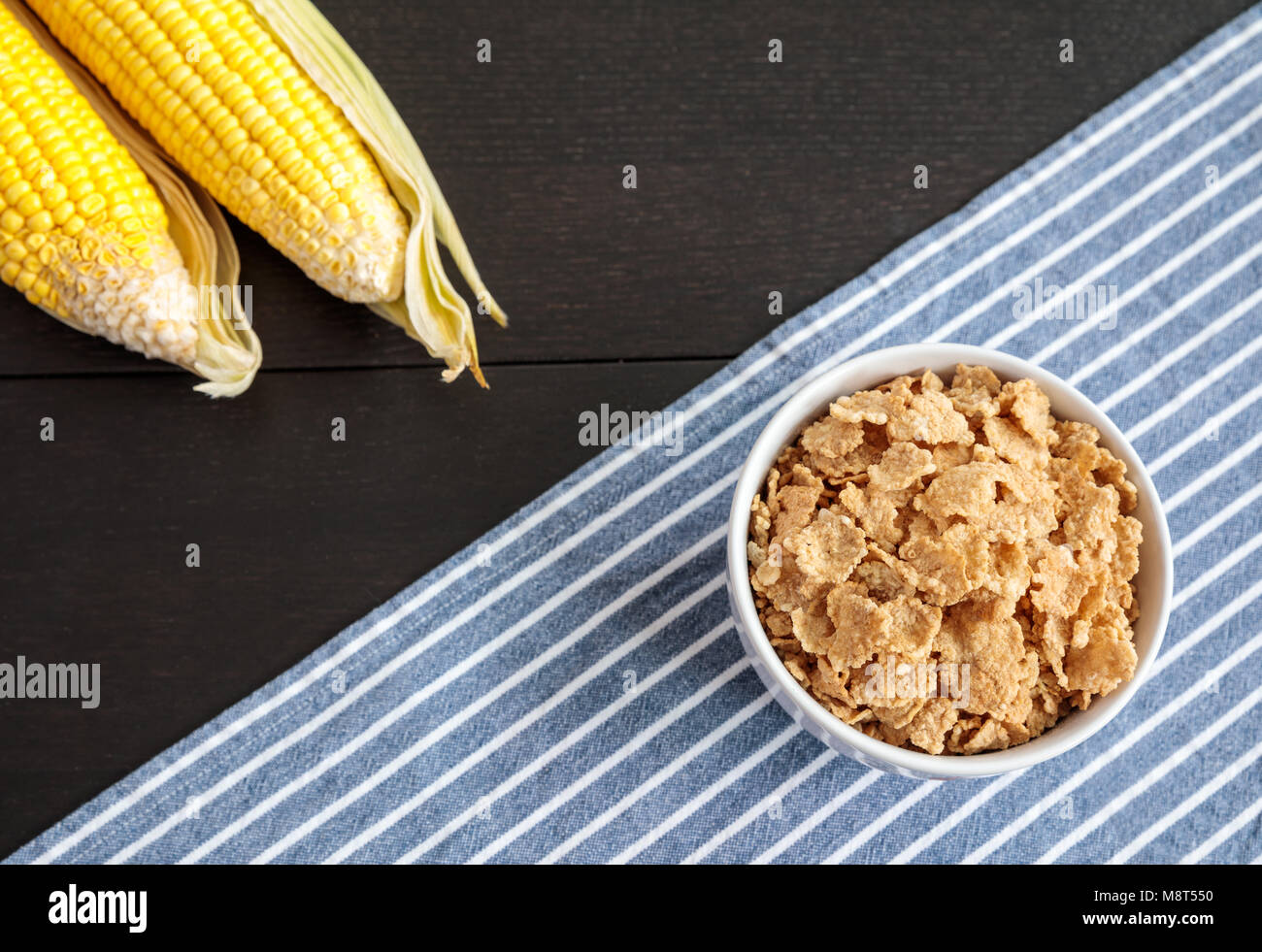 Healthy Corn Flakes with milk for Breakfast on table, food and drink ...