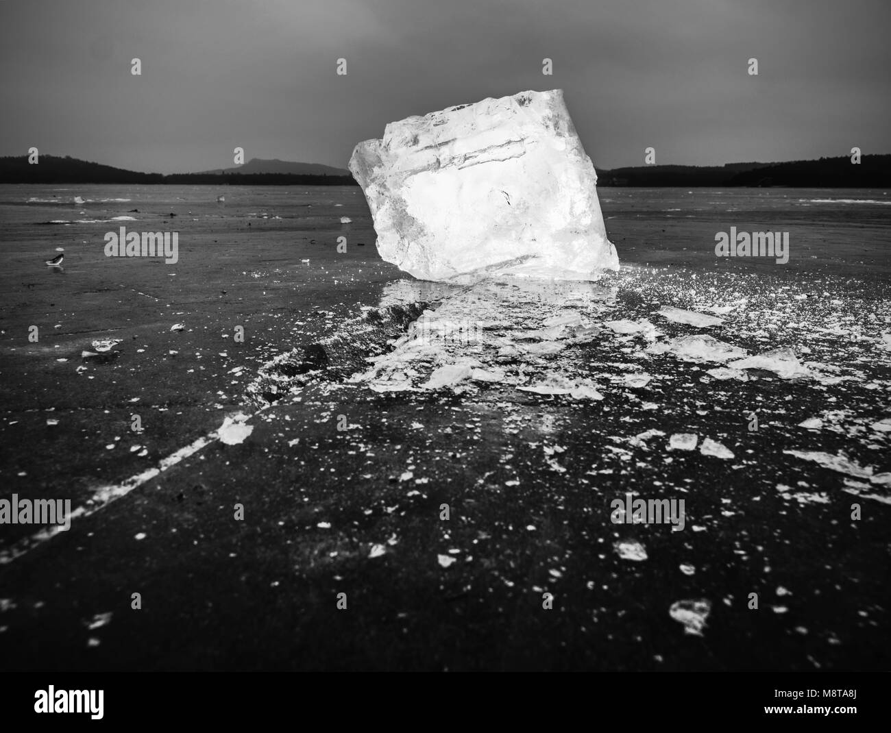 Ice with reflection on the lake. Crushed ice floe on reflective natural ...