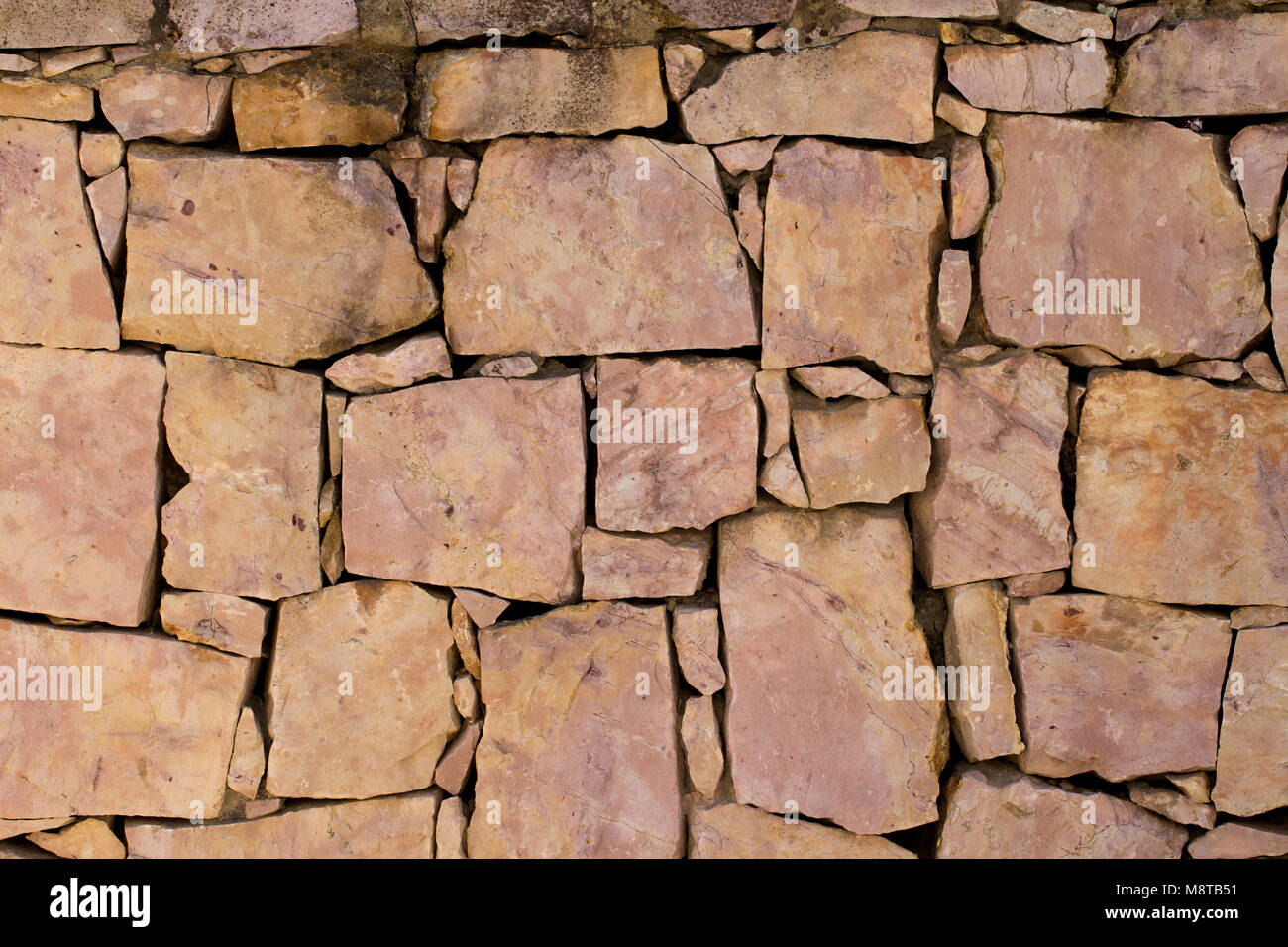 Horizontal stone wall of a nature rock - close up Stock Photo - Alamy