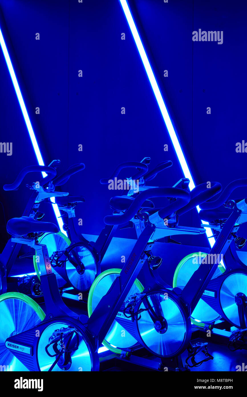 Detail of cycle studio with strip lighting. KXU London, London, United ...
